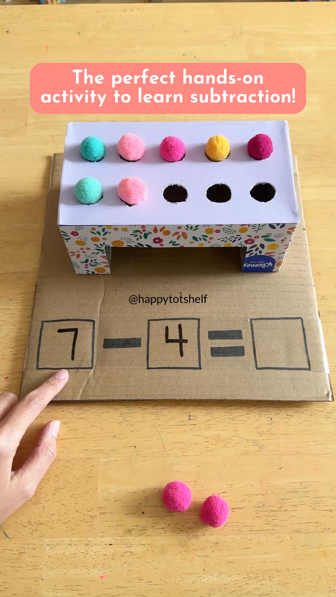 With this DIY subtraction box, kids physically push the pompoms into ...