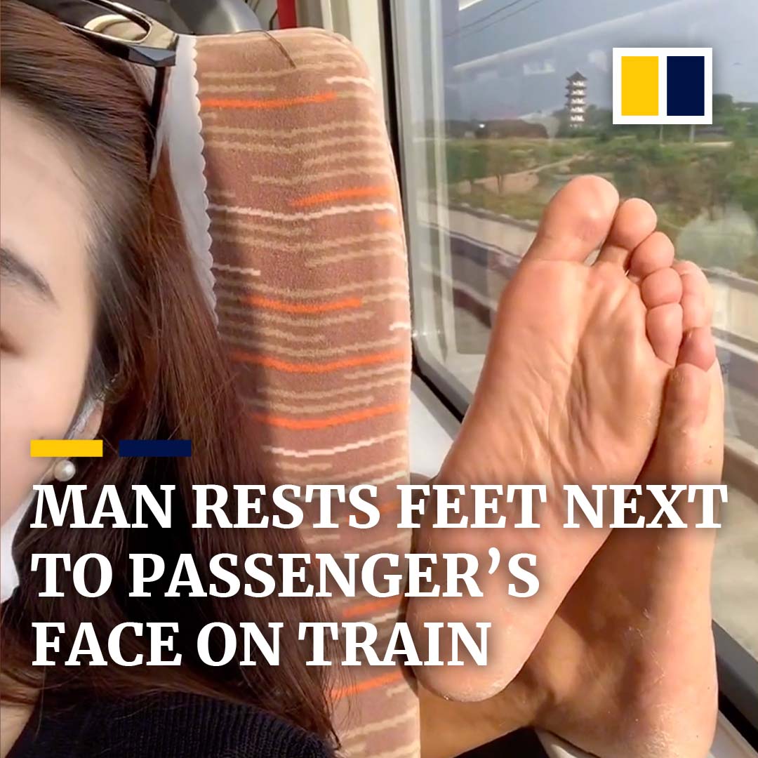 Man Rests Bare Feet Next To Passengers Face On Train In China Train