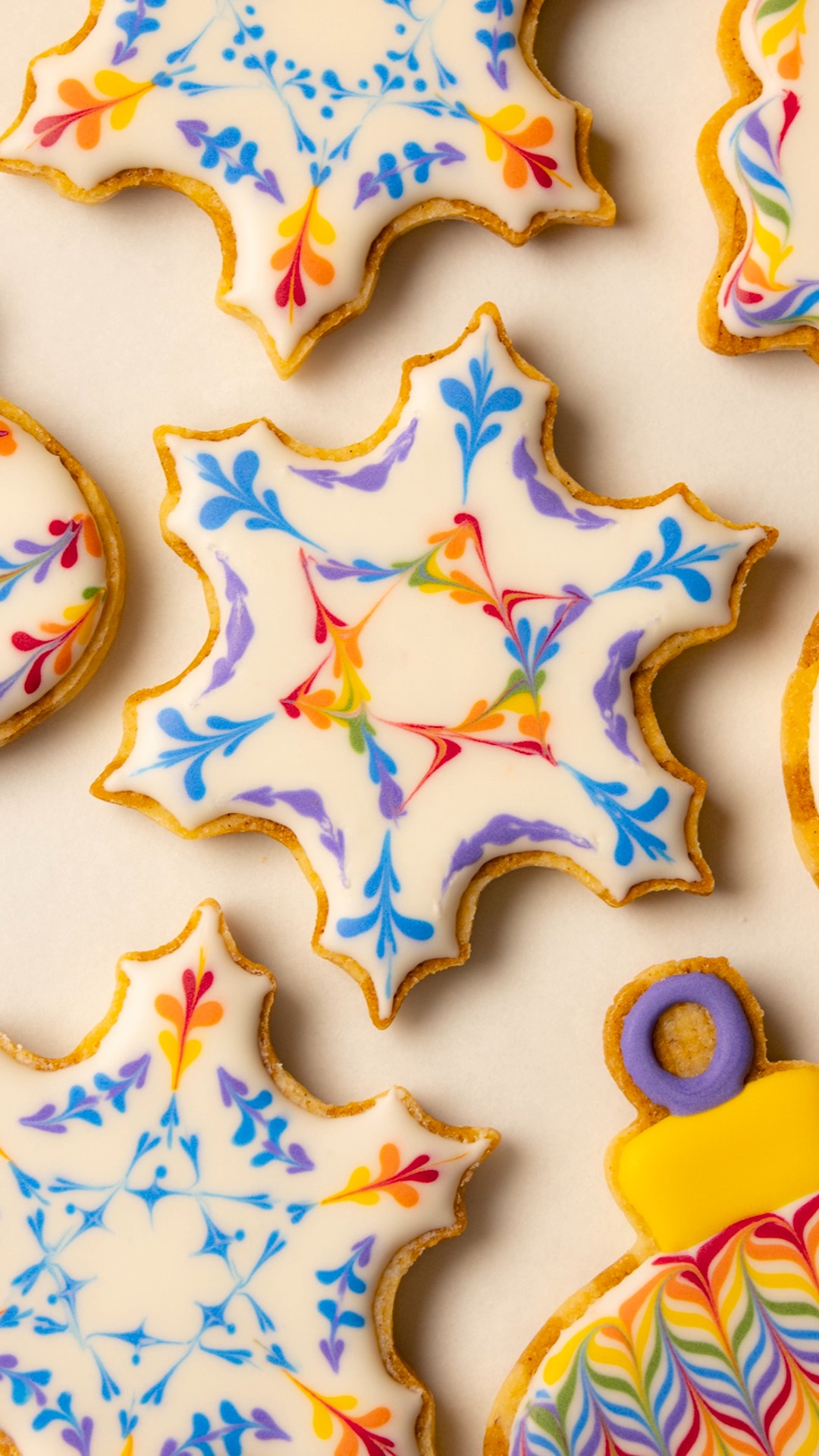 I made a rainbow set of decorated cookies for my friend to celebrate ...