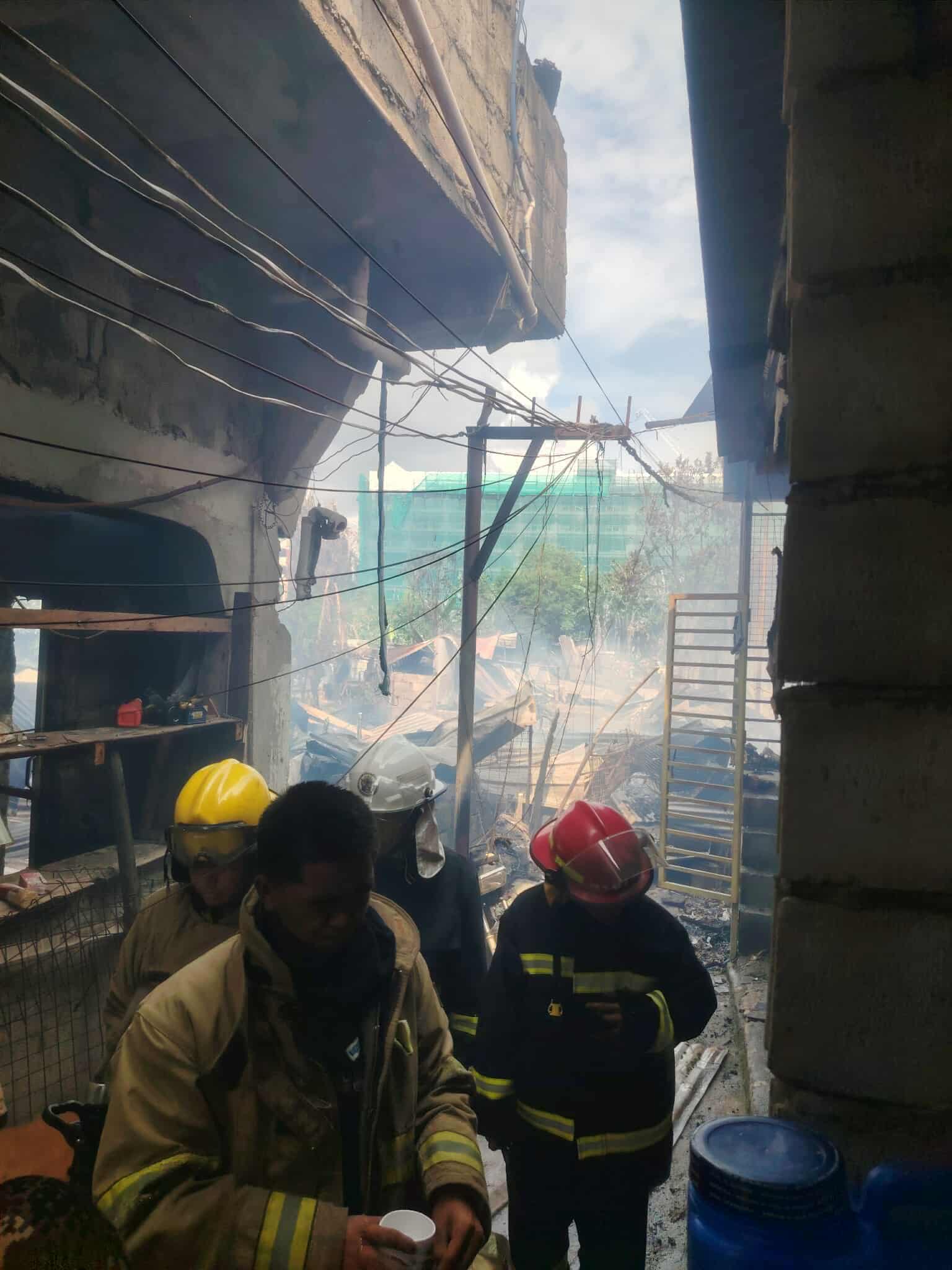 Philippine Firefighters Respond To A Third Alarm Fire That Hit A