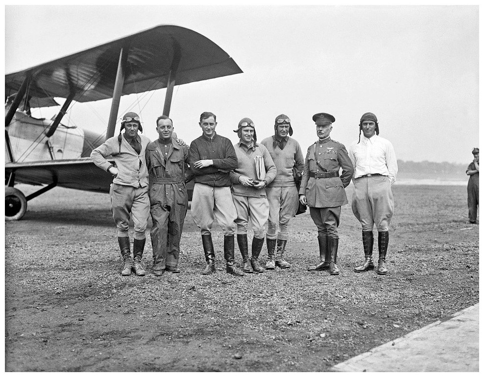 History - A team of pioneering aviators stands proudly beside their ...