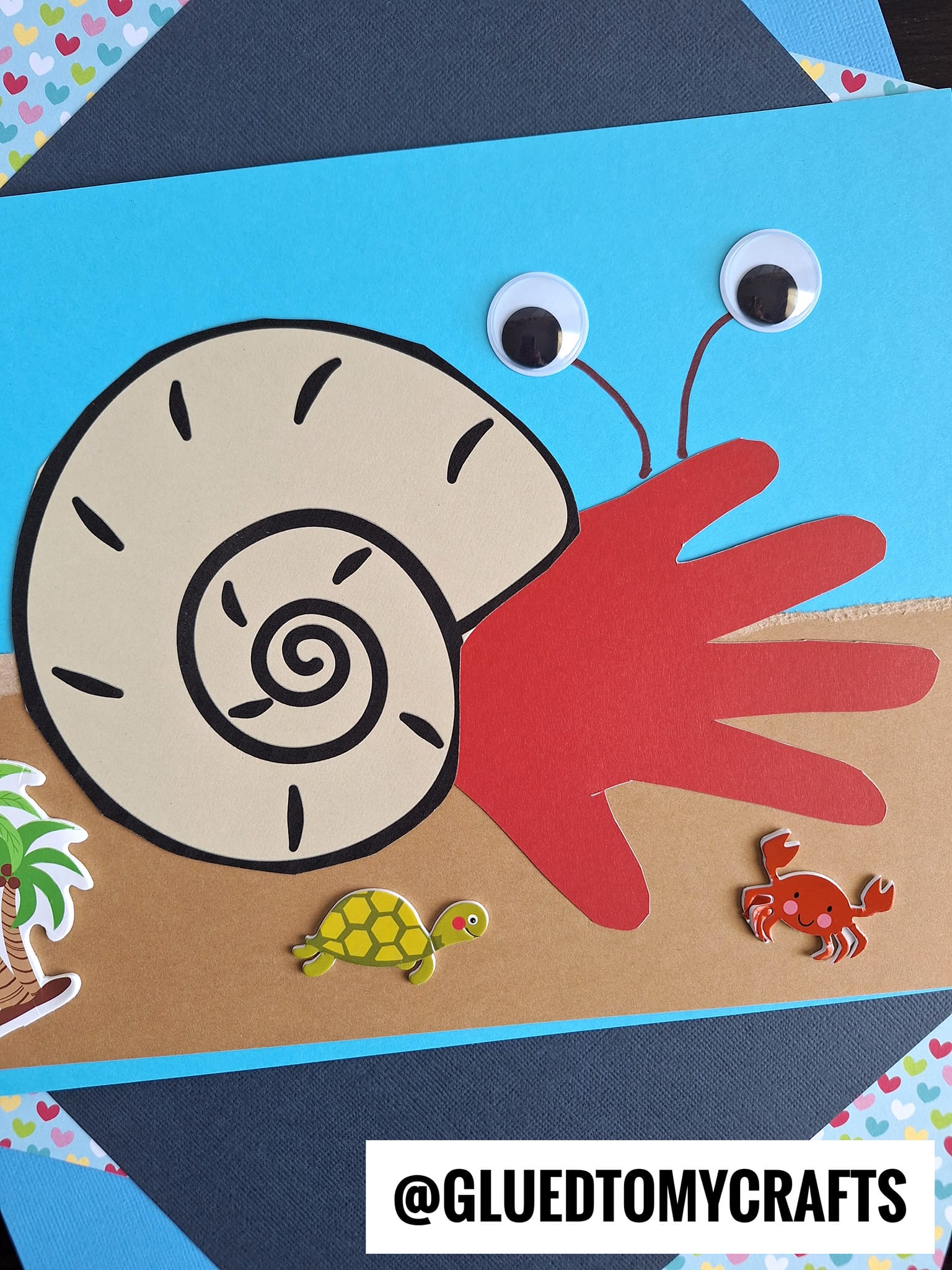 Glued - Handprint Hermit Crab Craft Idea